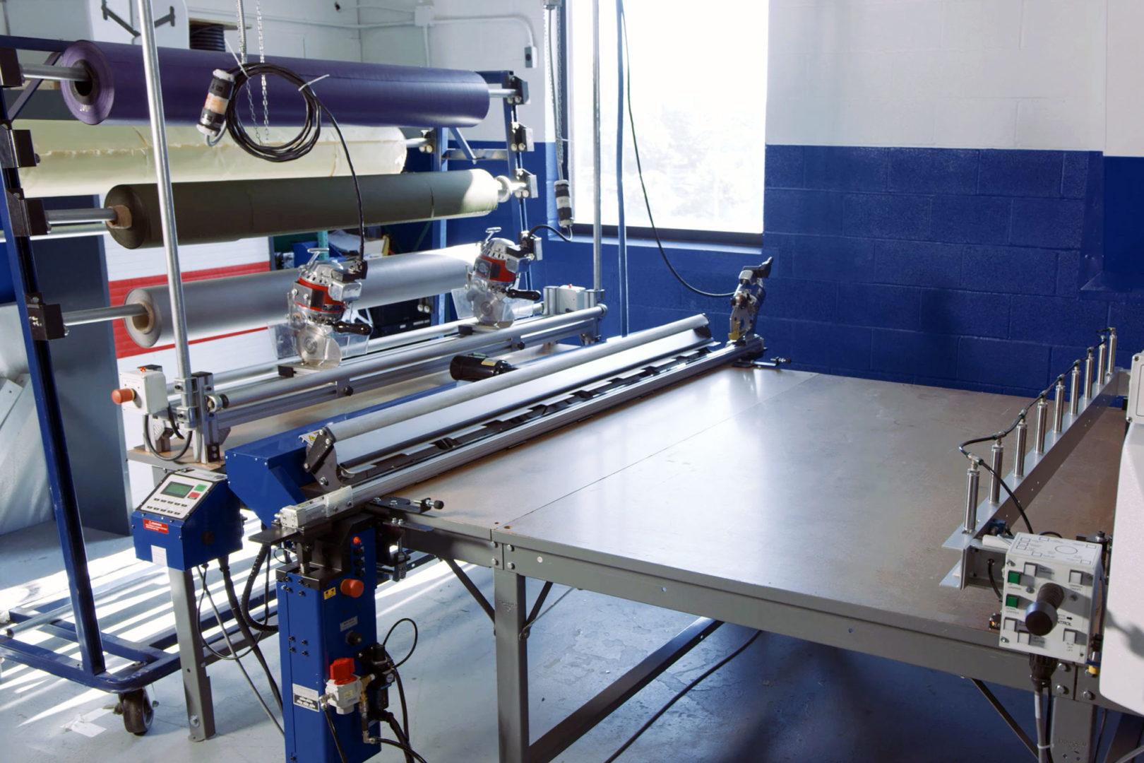 A-Frame Manual Feeder - Fabric Roll Rack - Eastman Machine